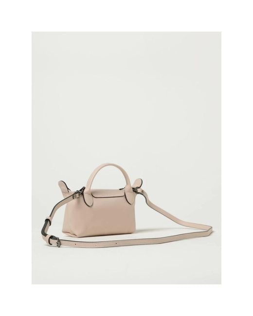Longchamp Handbags in Natural | Lyst UK
