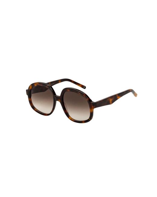 JPLUS Sunglasses in Brown | Lyst UK