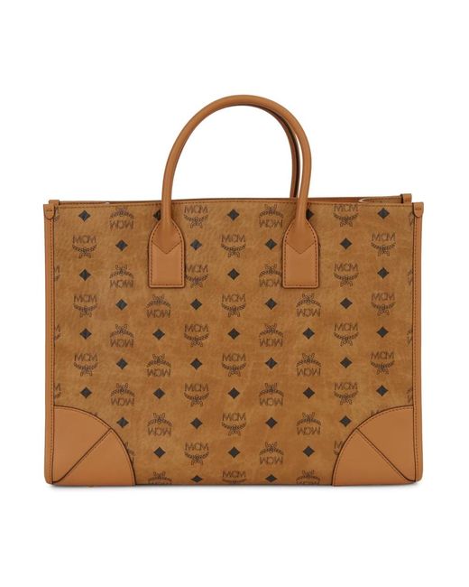 MCM Tote Bags in Brown | Lyst