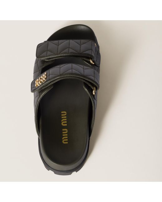 Miu Miu Matelassé Nappa Leather Slides in Black | Lyst