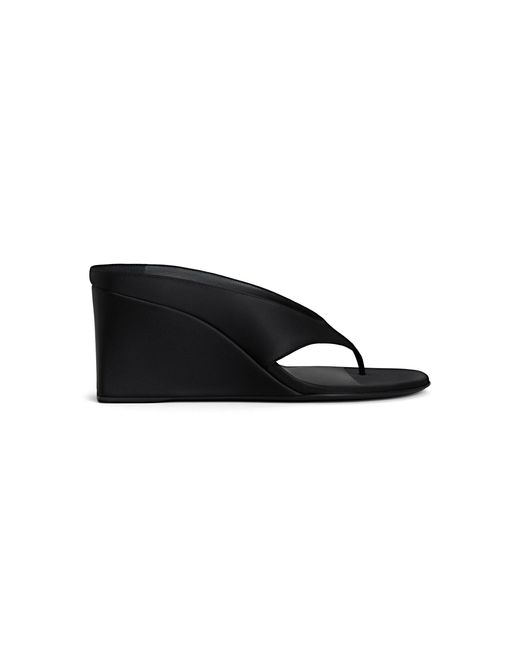 Alaïa Satin Wedge Thong Mules in Black | Lyst