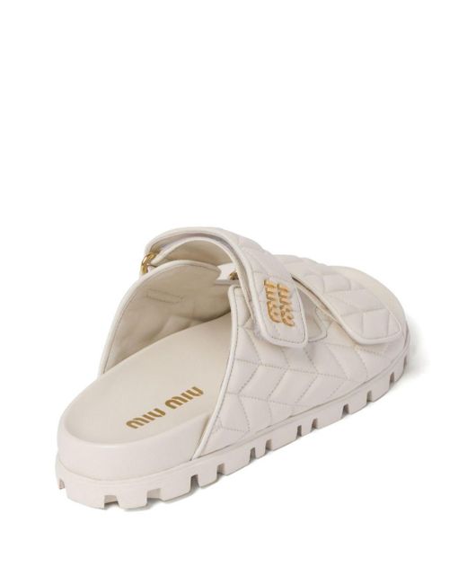 Miu Miu Matelassã Leather Slides in White | Lyst
