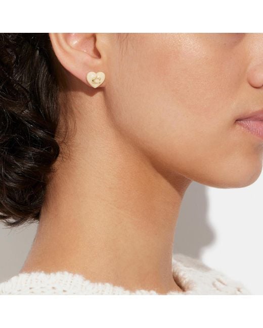 COACH Heart Resin Gold-tone Stud Earrings in Natural | Lyst