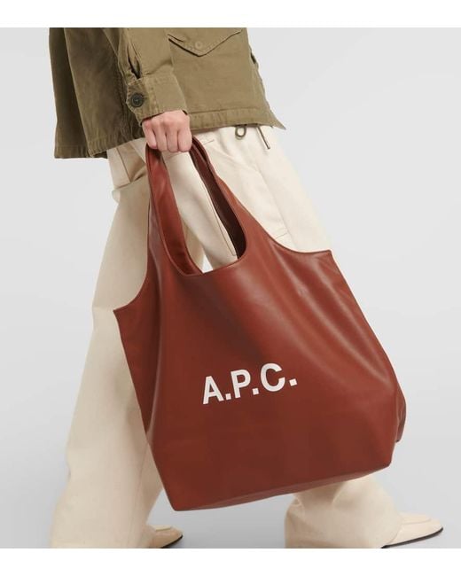 A.P.C. Ninon Logo Faux Leather Tote Bag in Brown | Lyst