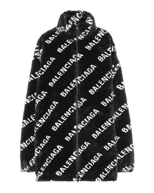 Balenciaga Faux Fur Logo Coat In Black Lyst