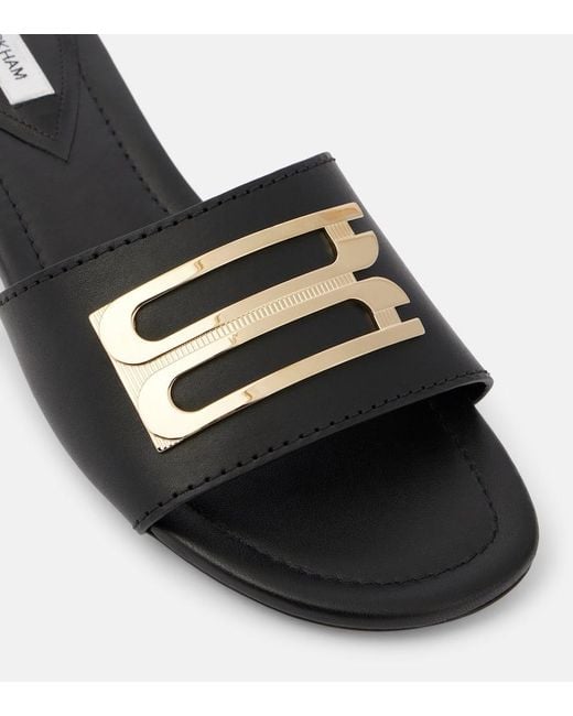 Victoria Beckham Logo Leather Slides in Black | Lyst