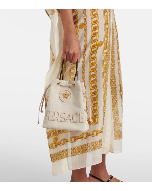 Versace La Medusa Small Canvas Bucket Bag in Natural | Lyst