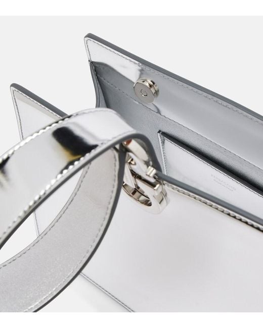 Ferragamo Gancini Small Metallic Leather Clutch in White | Lyst UK
