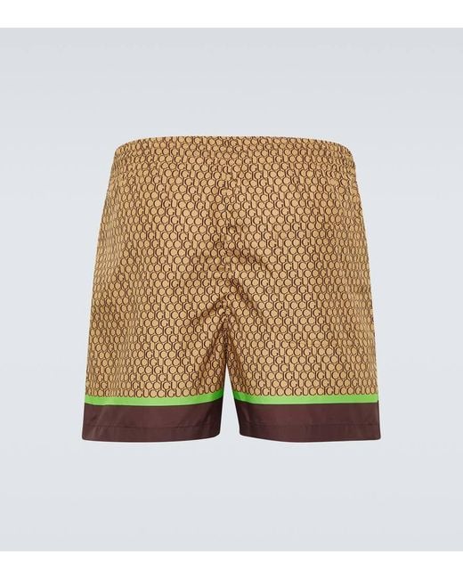 Gucci Logo Printed Swim Trunks in Natural for Men | Lyst