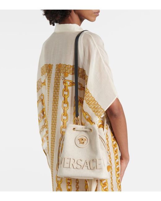 Versace La Medusa Small Canvas Bucket Bag in Natural | Lyst
