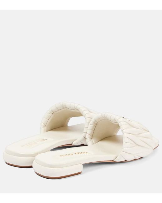 Miu Miu Logo Matelasse Leather Slides in Natural | Lyst