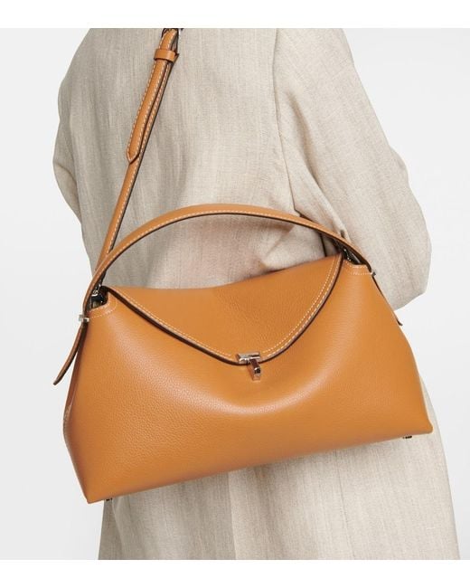 Totême T-lock Medium Leather Tote Bag in Brown | Lyst