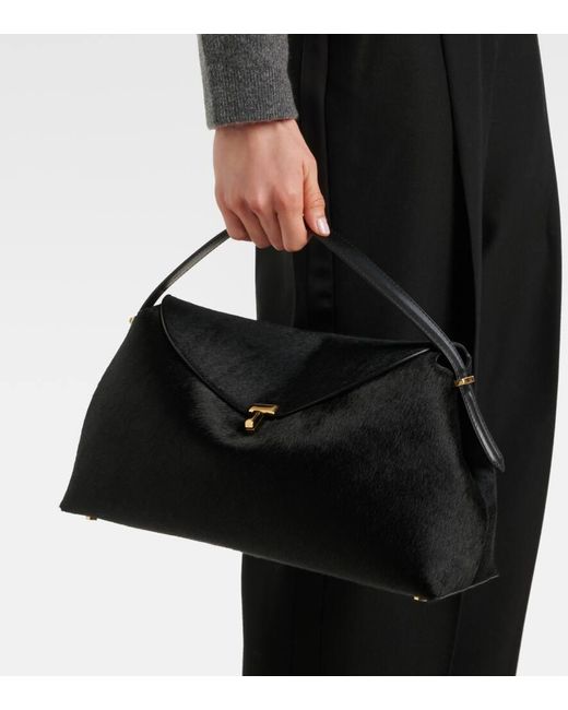 TOTEME T-lock Calf Hair Tote Bag in Black | Lyst