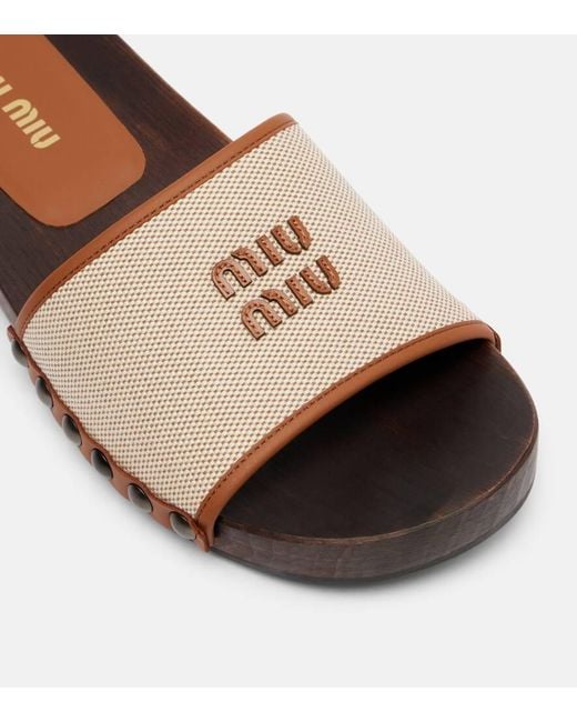 Miu Miu Logo Slides in Brown | Lyst