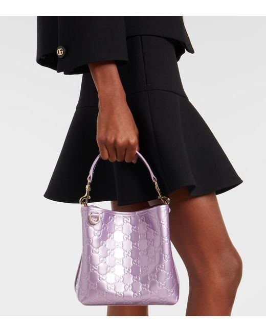 Gucci Gg Emblem Medium Metallic Leather Bucket Bag in Purple | Lyst UK