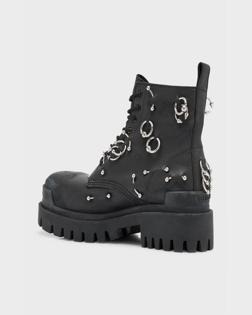 Balenciaga Strike Pierced Leather Boots in Black for Men | Lyst
