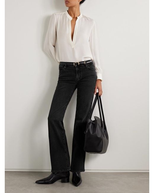 FRAME The Rodeo Mid-Rise Flared Jeans in Black | Lyst UK