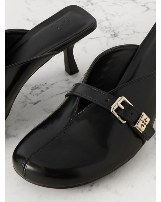 Ganni Sue Buckled Oleatex Mules in Black | Lyst UK