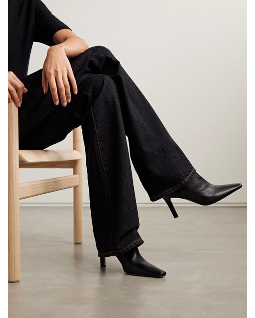 The Row Carla Leather Ankle Boots in Black | Lyst UK