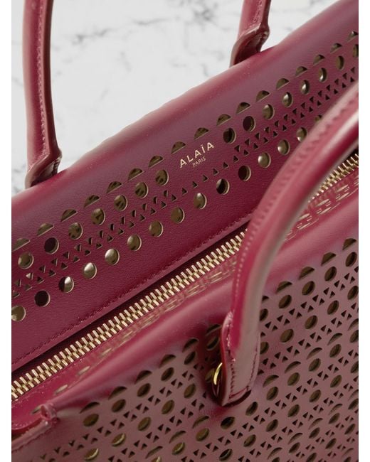 Alaïa New Mina 20 Laser-Cut Leather Tote in Red | Lyst