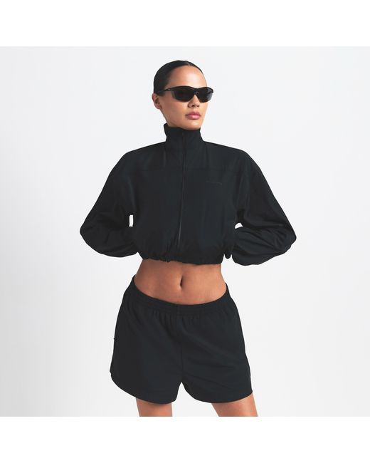 Nike Skims Woven Nylon Crop Jacket in Black | Lyst
