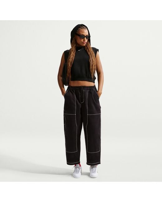 Nike Loose Low-Rise Carpenter Trousers in Black | Lyst