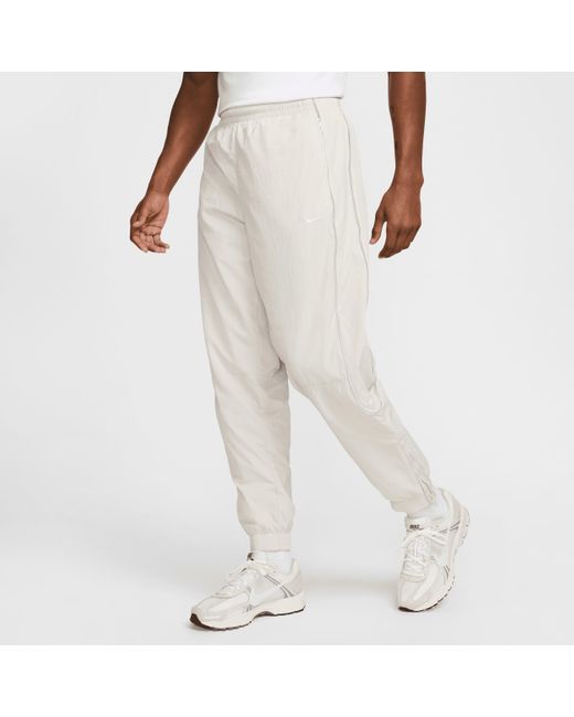 Nike Solo Swoosh Track Pants in White for Men | Lyst