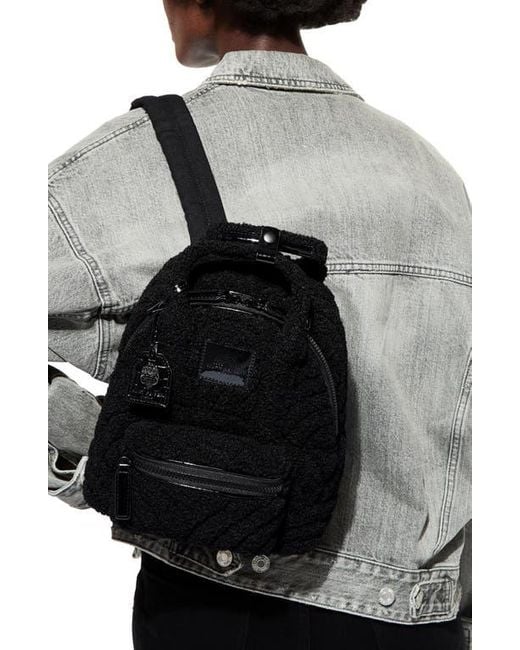 Kurt Geiger Small Southbank Faux Shearling Backpack in Black | Lyst