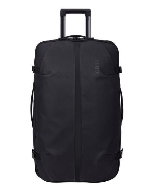 Thule Aion Wheeled Duffle Bag in Blue | Lyst