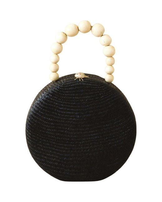 LIKHÂ Round Top Handle Bag in Black | Lyst