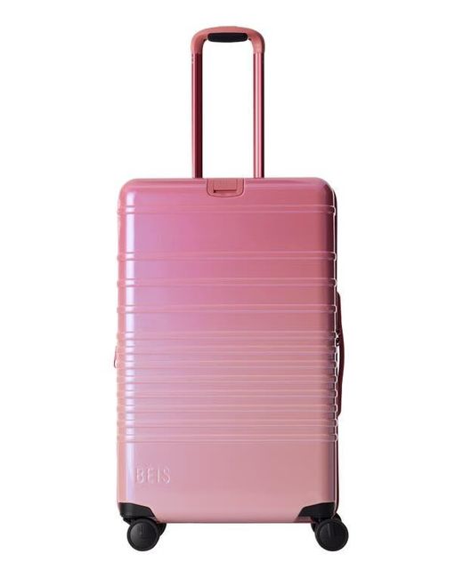 BEIS The Wicked Medium Expandable Check-In Roller in Pink | Lyst