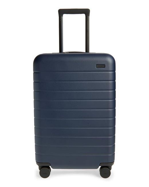 AWAY The Bigger Carry-On Flex Suitcase in Blue | Lyst