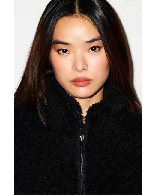Skims Faux Fur Oversize Mock Neck Jacket in Black | Lyst