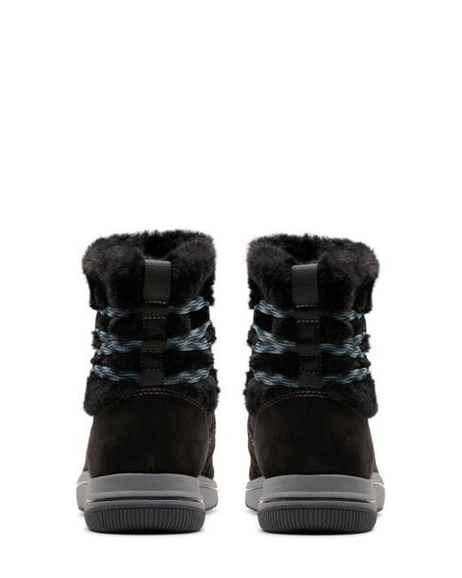 Clarks Breeze Cozy Faux Fur Lined Boot in Black | Lyst
