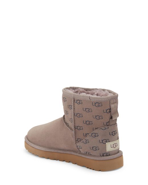 Ugg Classic Mini Embossed Logo Bootie In Brown Lyst