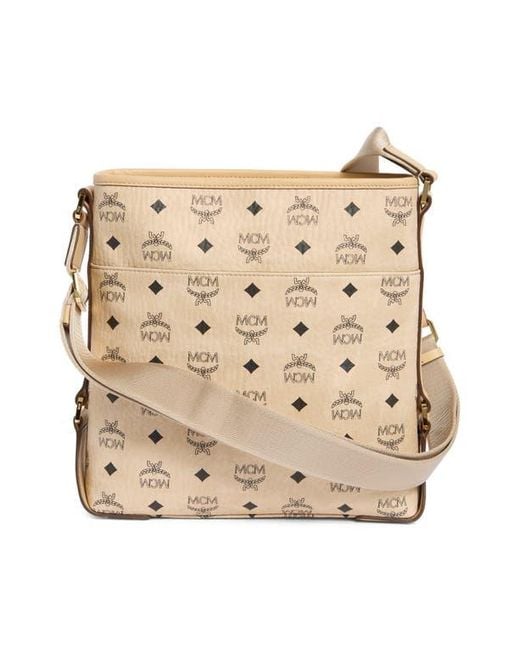 MCM Monogrammed Leather Messenger Bag in Natural | Lyst