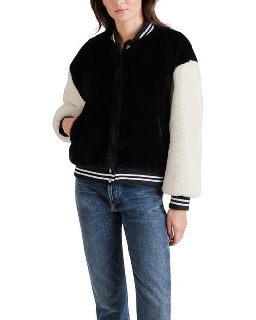 Steve Madden Faux Fur Varsity Jacket in Black | Lyst