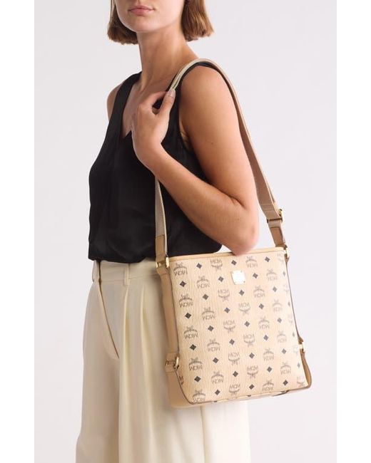MCM Monogrammed Leather Messenger Bag in Natural | Lyst