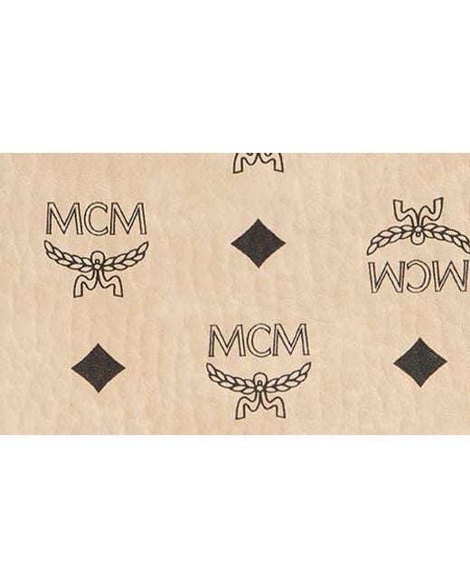 MCM Monogrammed Leather Messenger Bag in Natural | Lyst