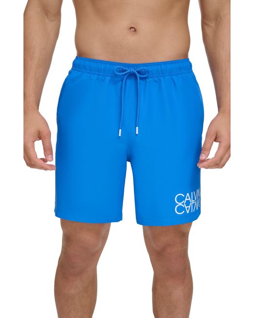 Calvin Klein Reflection Logo Upf 40 Swim Trunks In Blue For Men Lyst