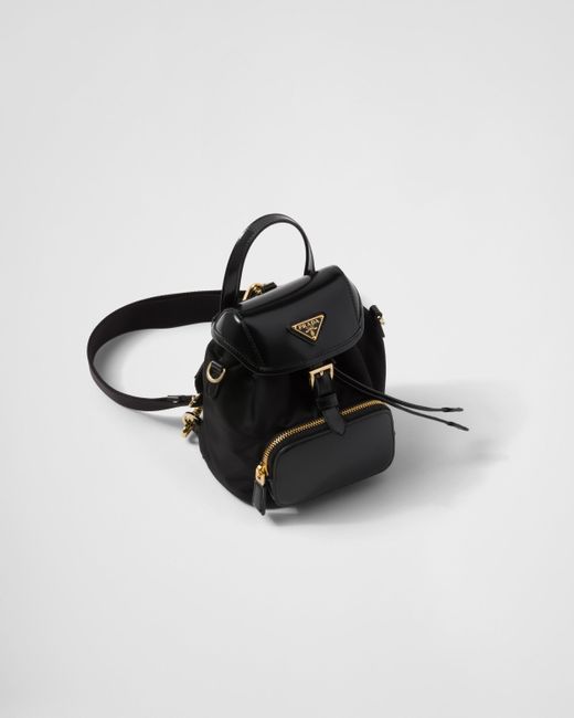 Prada Small Re-nylon And Brushed Leather Backpack in White | Lyst