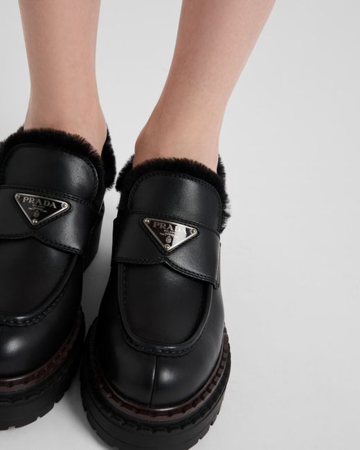 Prada Double Chocolate Leather And Shearling Loafers in Black | Lyst
