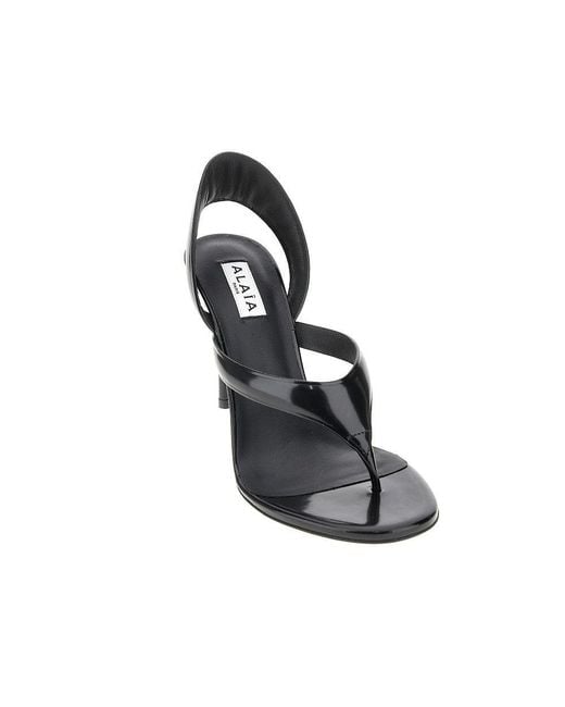 Alaïa Smooth Leather Thong Sandals in Black | Lyst