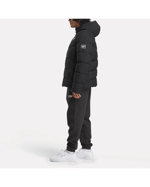 Reebok Stretch Puffer Jacket in Black for Men | Lyst