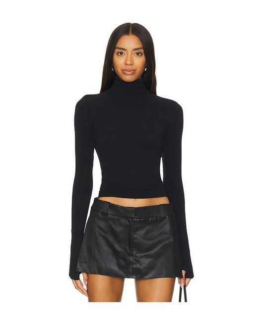 Commando Turtleneck Thumbhole Bodysuit in Black | Lyst