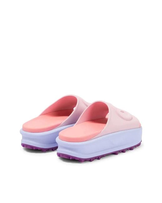 Gucci Miami GG-Embossed Pink Rubber Slides in Purple | Lyst