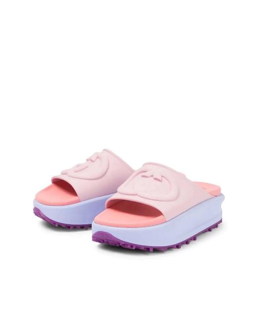 Gucci Miami GG-Embossed Pink Rubber Slides in Purple | Lyst