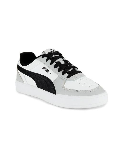 PUMA Carter Perforated Leather Low Top Sneakers in Black for Men | Lyst
