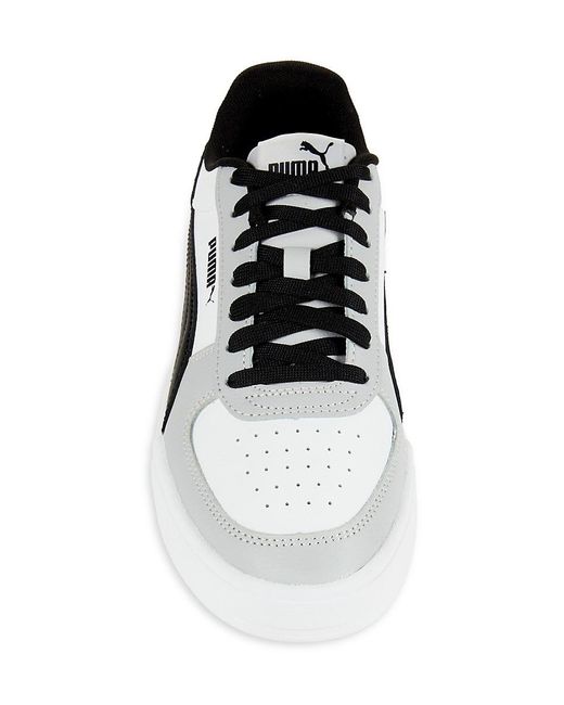 PUMA Carter Perforated Leather Low Top Sneakers in Black for Men | Lyst