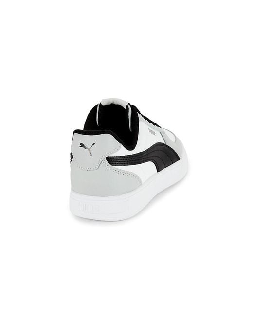 PUMA Carter Perforated Leather Low Top Sneakers in Black for Men | Lyst
